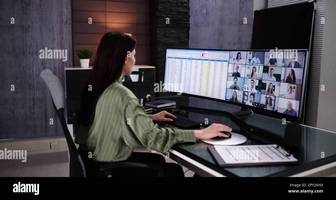 Remote Work On Multiple Monitors. Business Video Conference Stock Photo ...