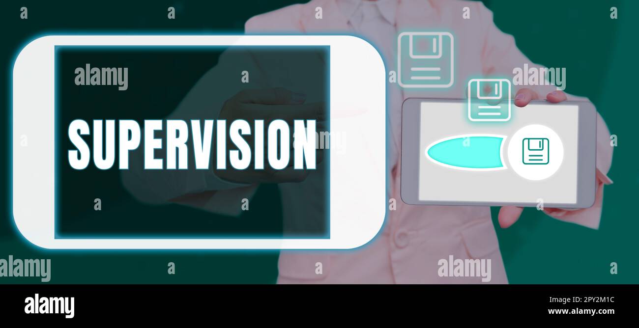 Sign displaying Supervision, Word for monitoring and coordinating the ...
