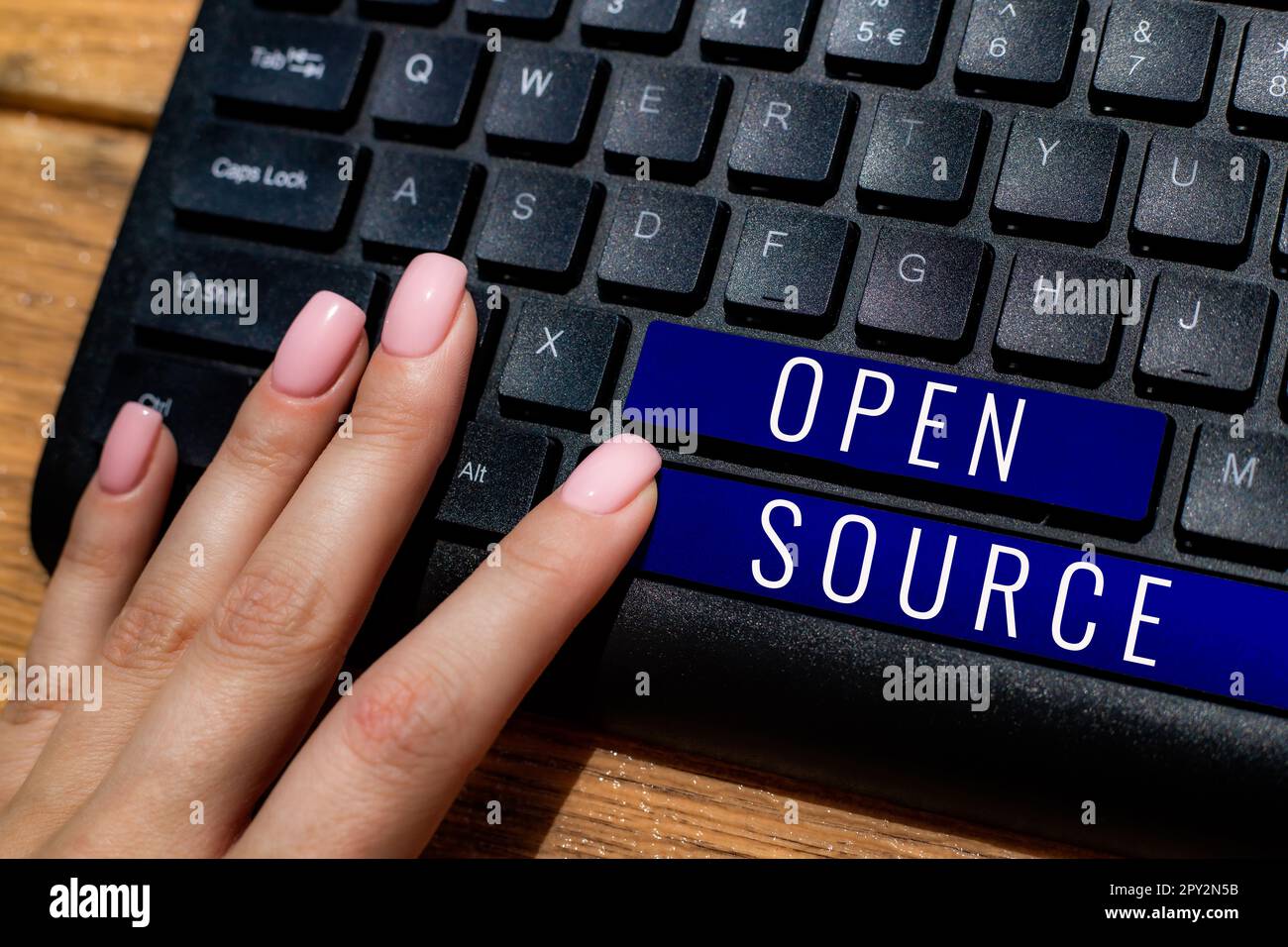 Sign displaying Open Source, Business concept denoting software which original source code ...