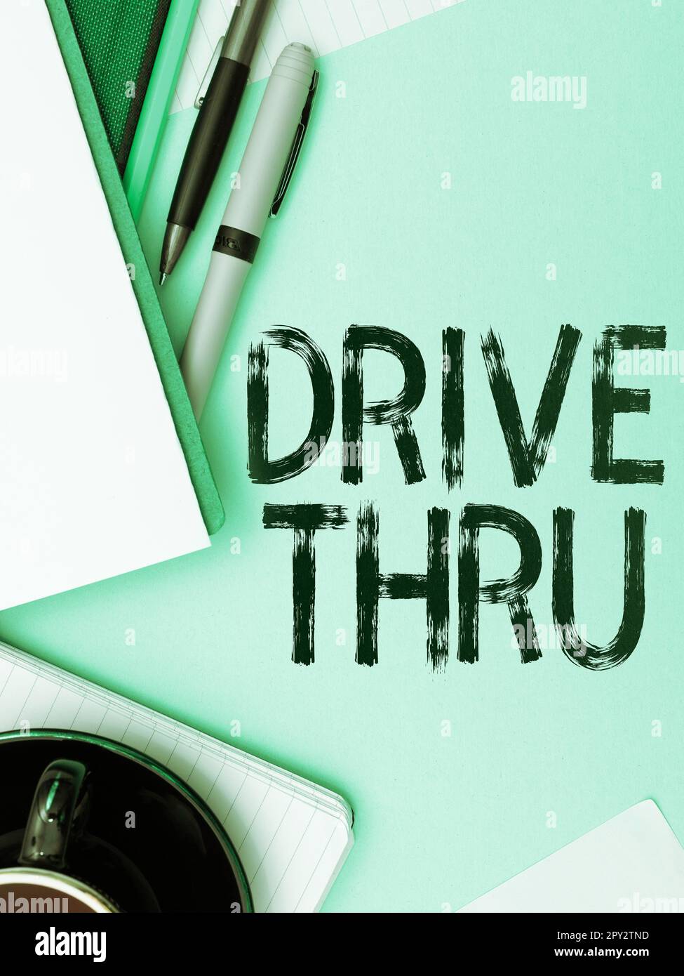 Hand writing sign Drive Thru, Business approach place where you can get ...