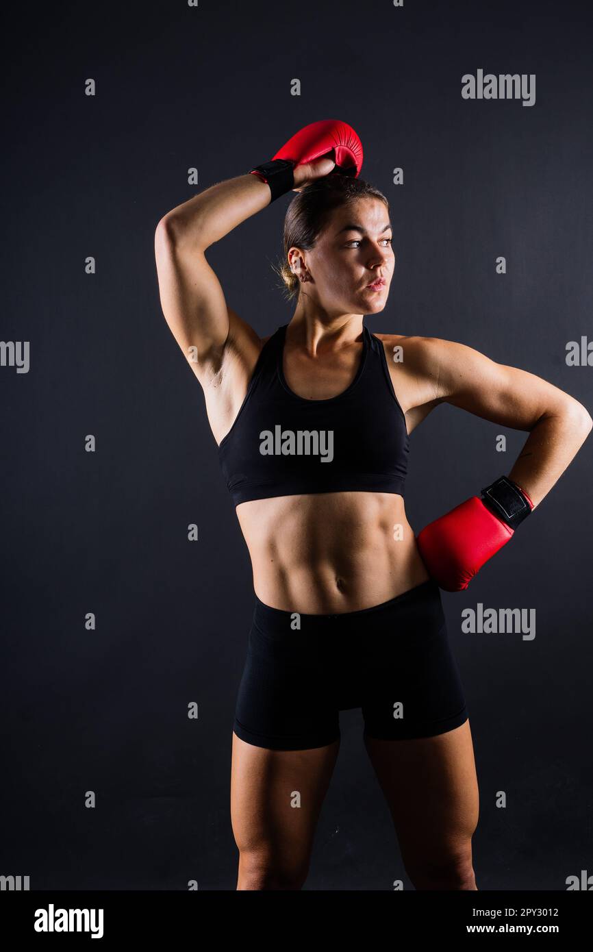 Young woman athletic female MMA fighter is training. Concept of sport ...