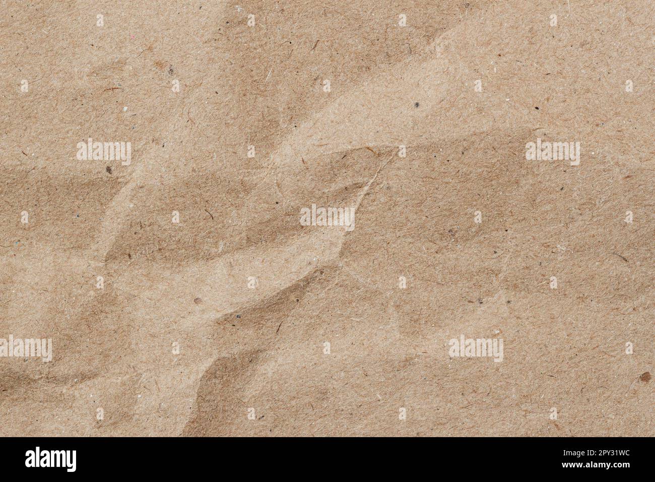 Crumpled paper with wrinkles, ecological or craft paper, brown surface ...