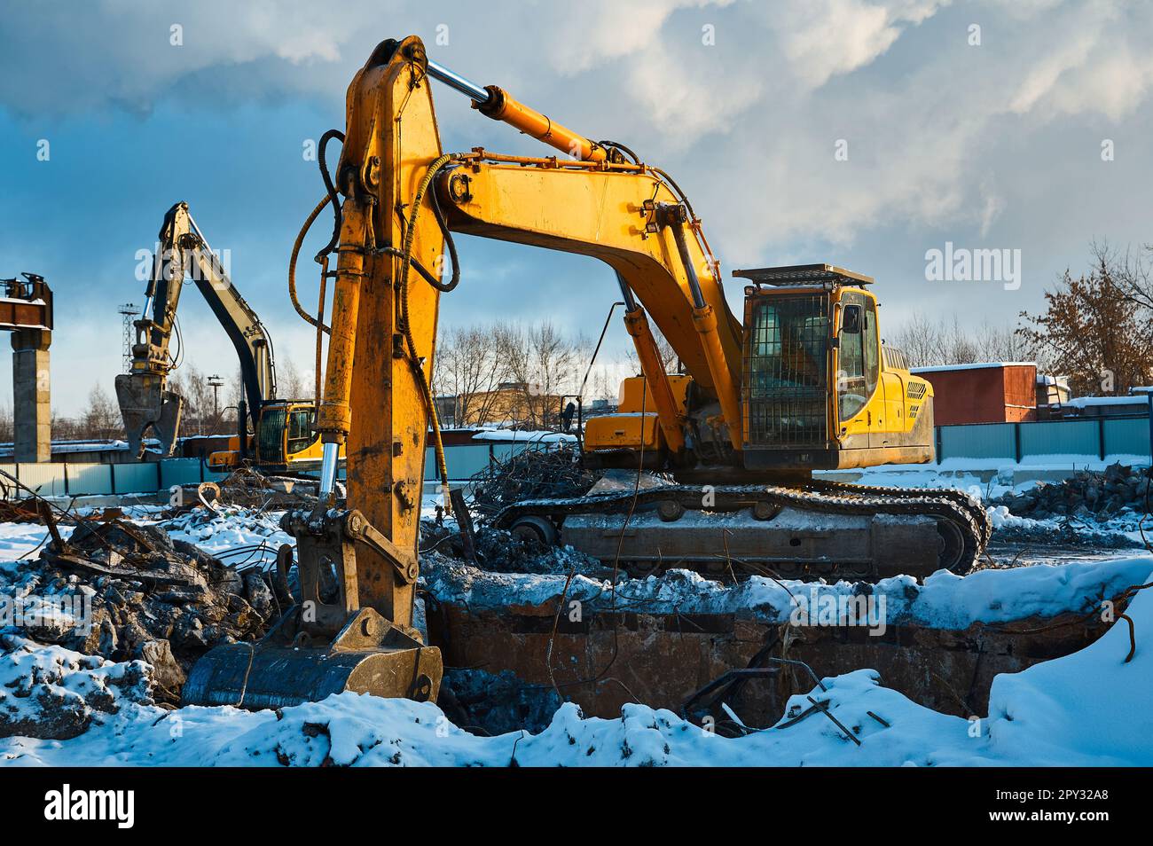 Crawler excavator bucket at process of dismantling closeup Stock Photo ...