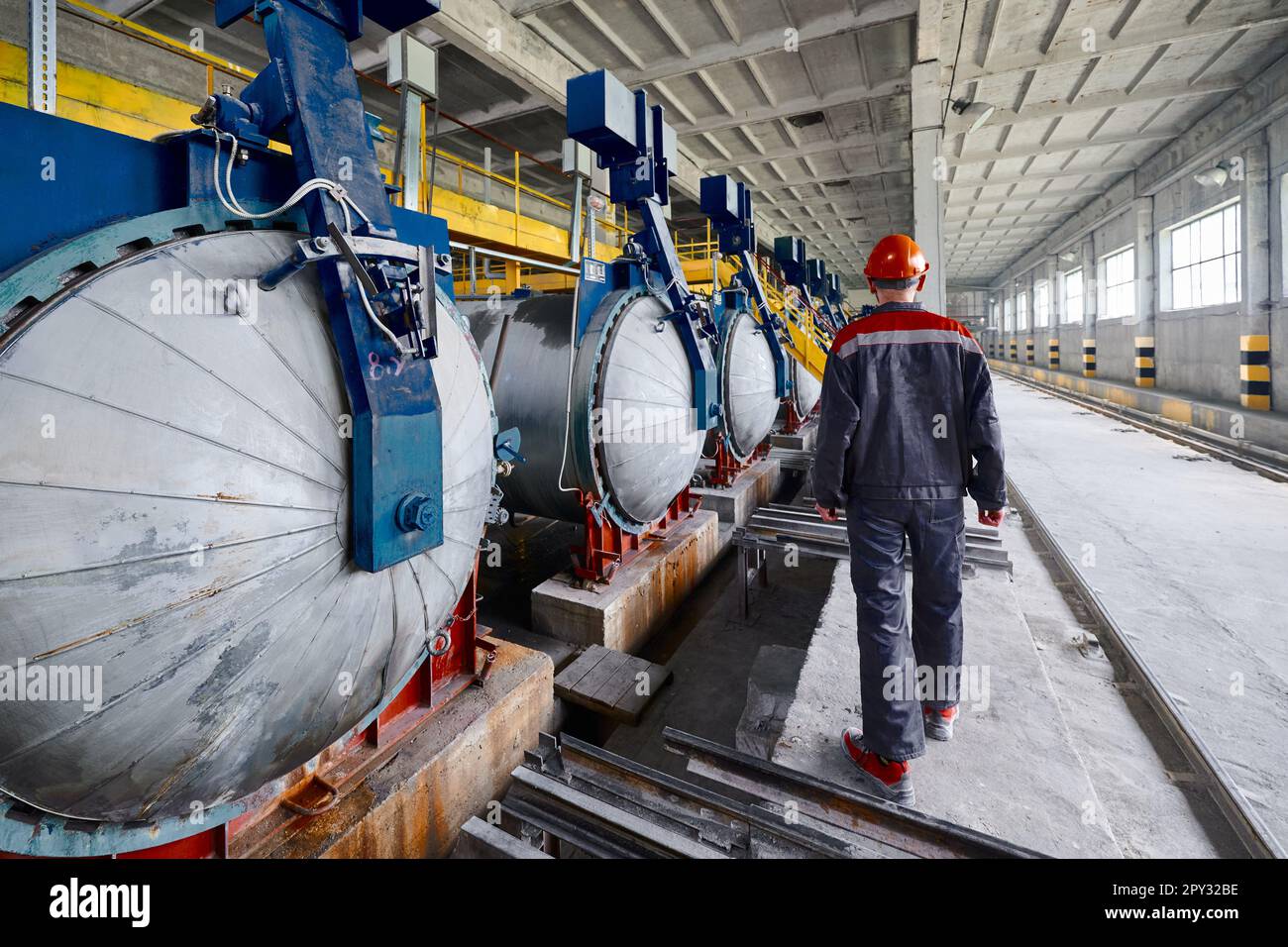 Autoclave workshop with tanks for silica blocks hardening Stock Photo ...