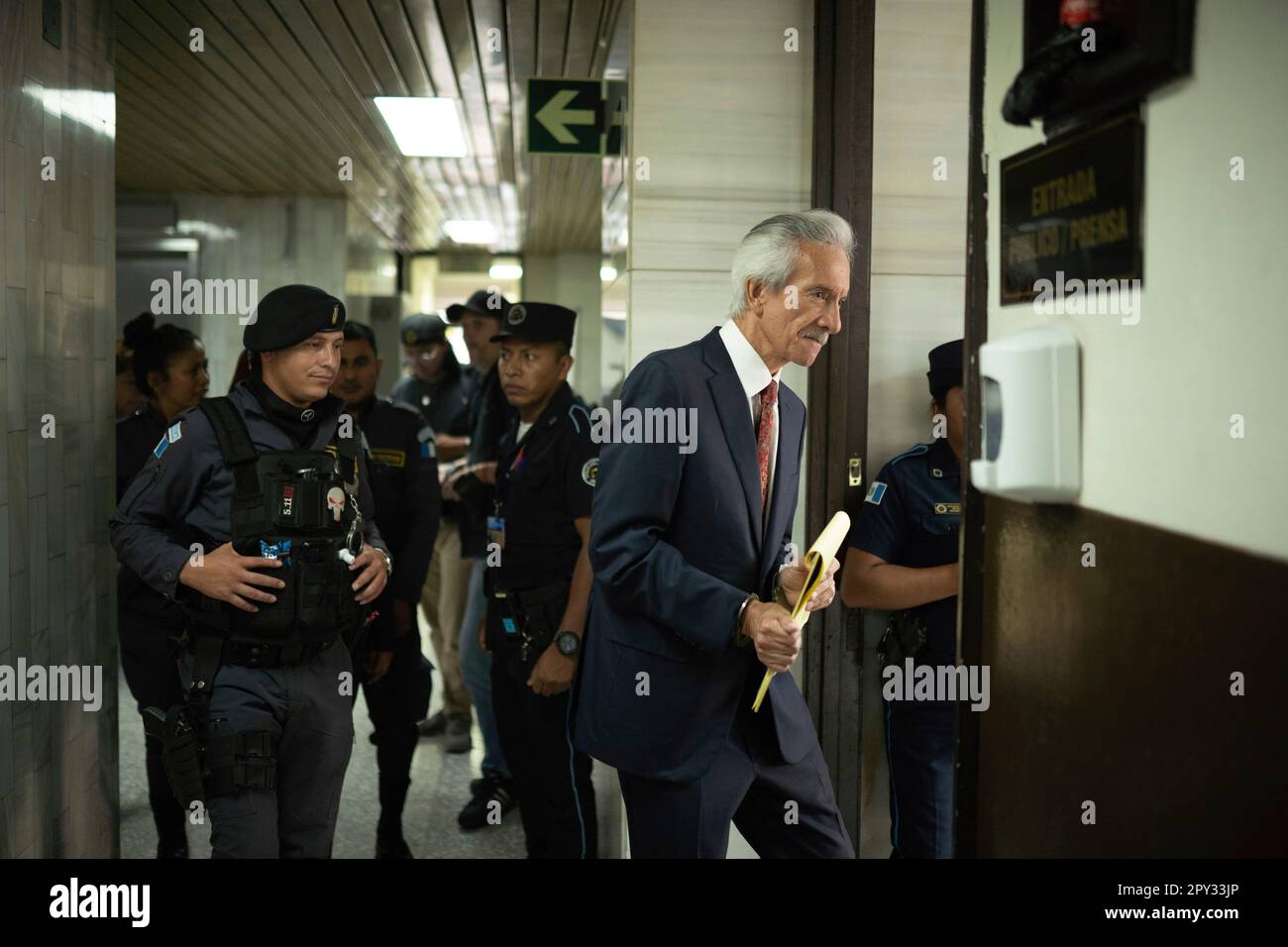 Award-winning journalist Jose Ruben Zamora enters the courtroom during ...