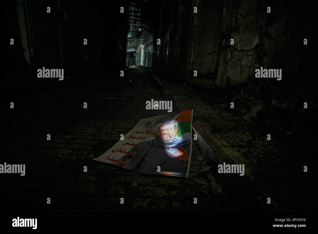 A portrait of the late Palestinian prisoner Khader Adnan seen on the ...