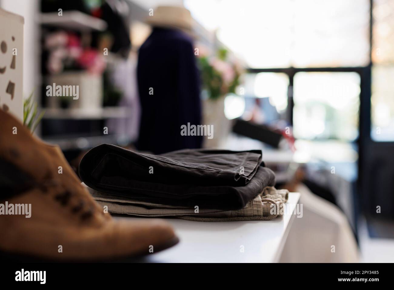 Empty modern boutique in shopping centre, new fashion collection on ...