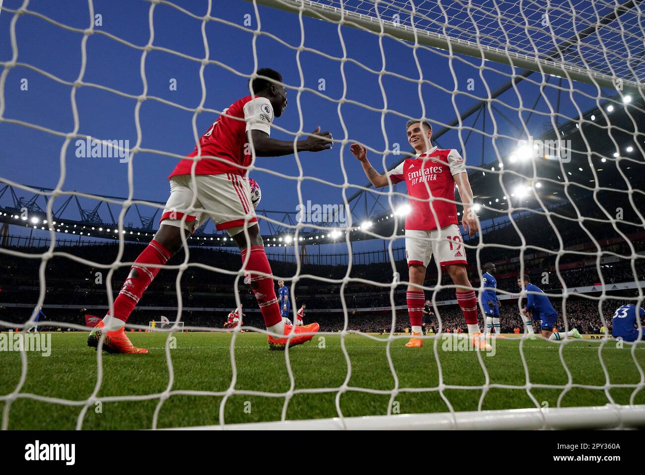 Arsenal’s Leandro Trossard (right) and Arsenal’s Bukayo Saka celebrate their sides second goal ...