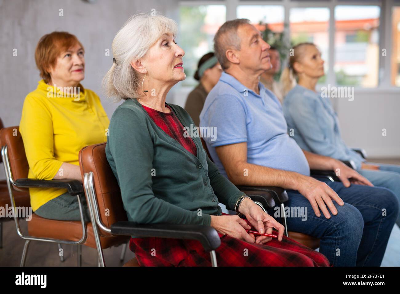 Elderly people study in classroom on refresher courses Stock Photo - Alamy