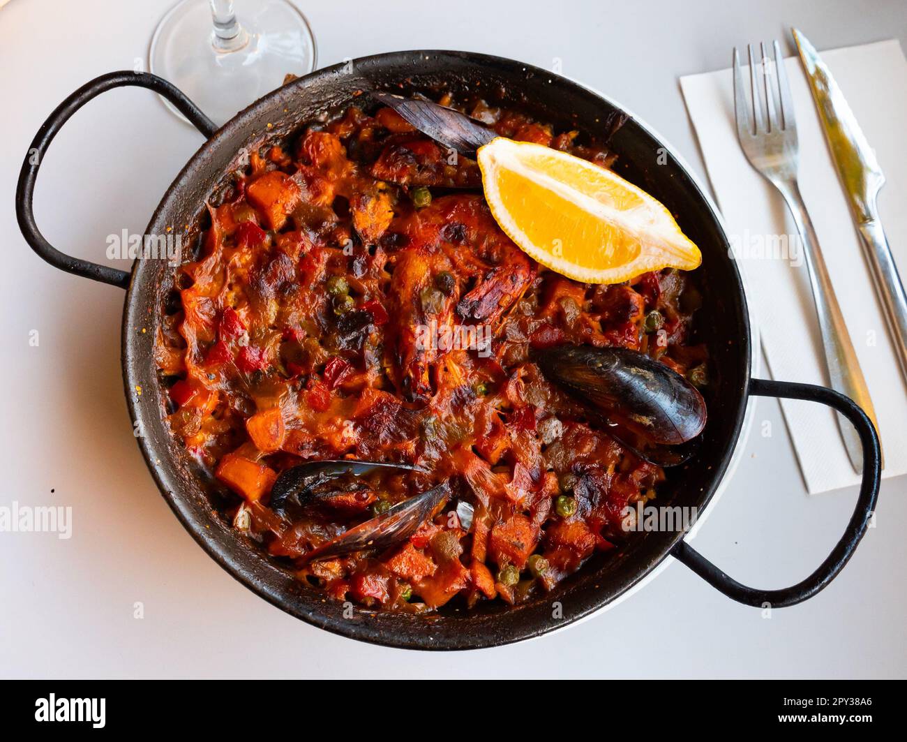 Delicious national Spanish dish is Paella with seafood Stock Photo - Alamy