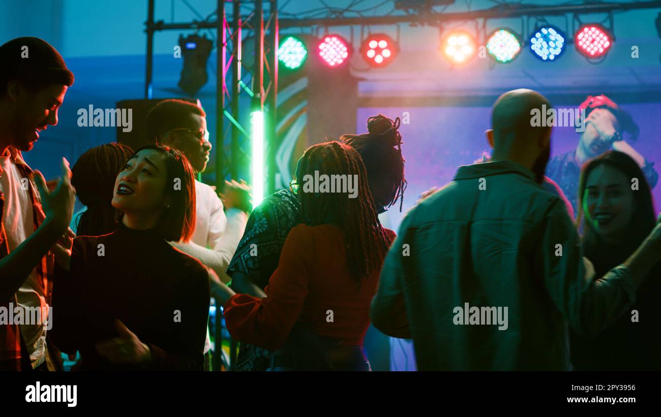 People dancing in pairs on slow music, enjoying romantic waltz on club ...