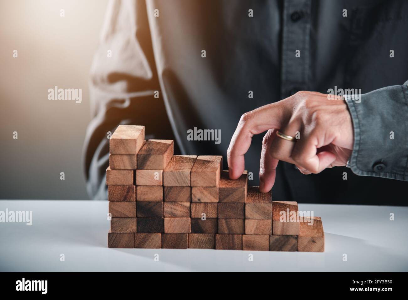 Business two finger symbol walking up on wood blocks shape staircase to ...