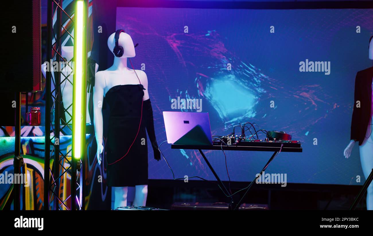 DJ mixing panel at funky nightclub used for entertainment and modern ...