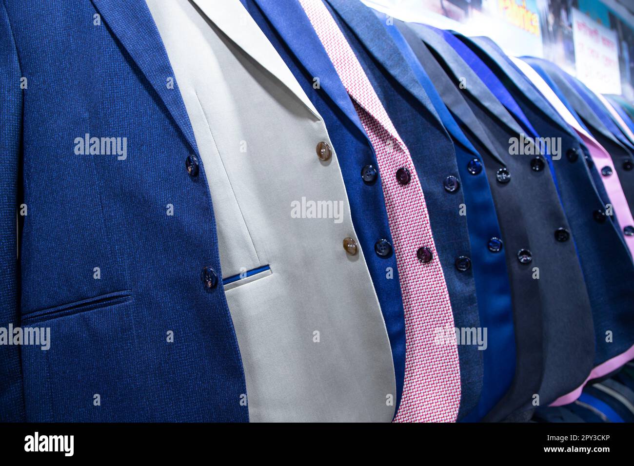 Mens clothing on hangers hi-res stock photography and images - Alamy