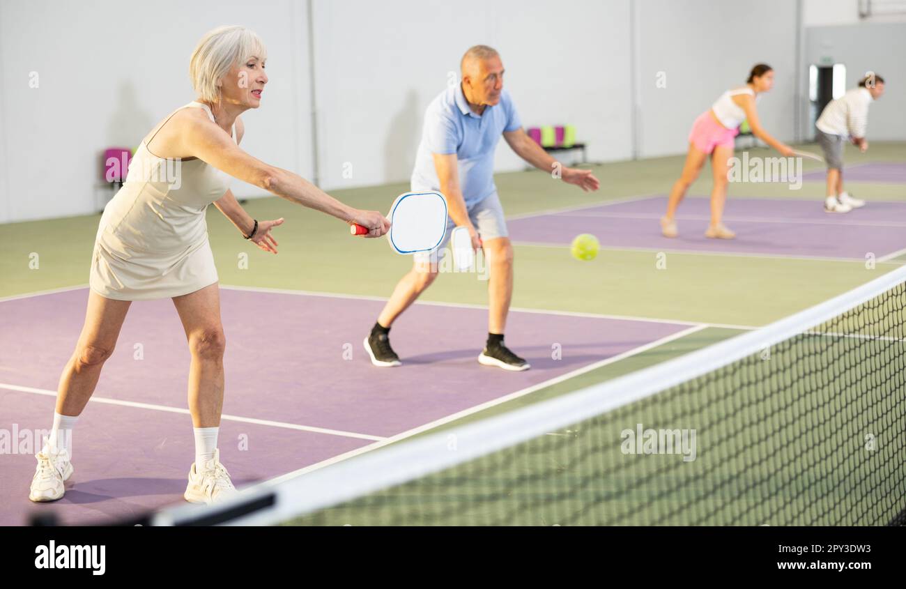 Man woman playing pickleball in hi-res stock photography and images - Alamy