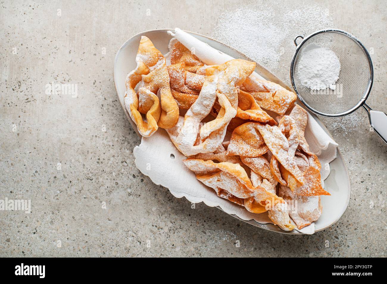 Traditional sweet crisp pastry - faworki or angel wings, deep-fried and ...