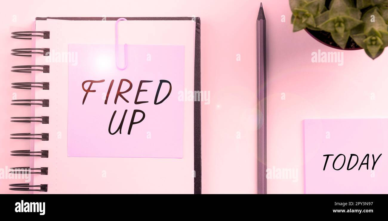 Text caption presenting Fired Up, Business concept means that someone ...