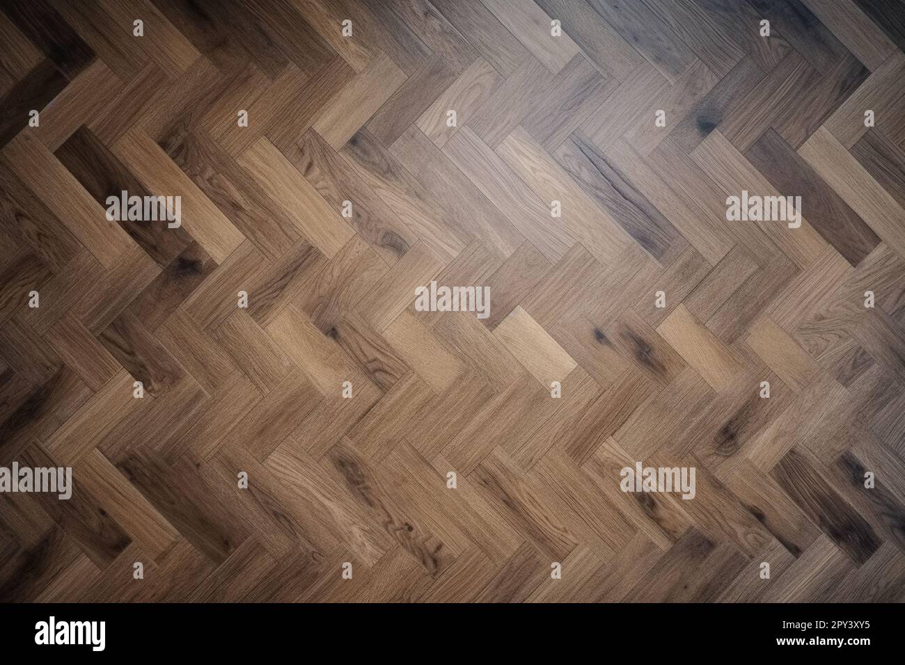 Top view of a parquet floor under natural light. Wooden pattern with ...