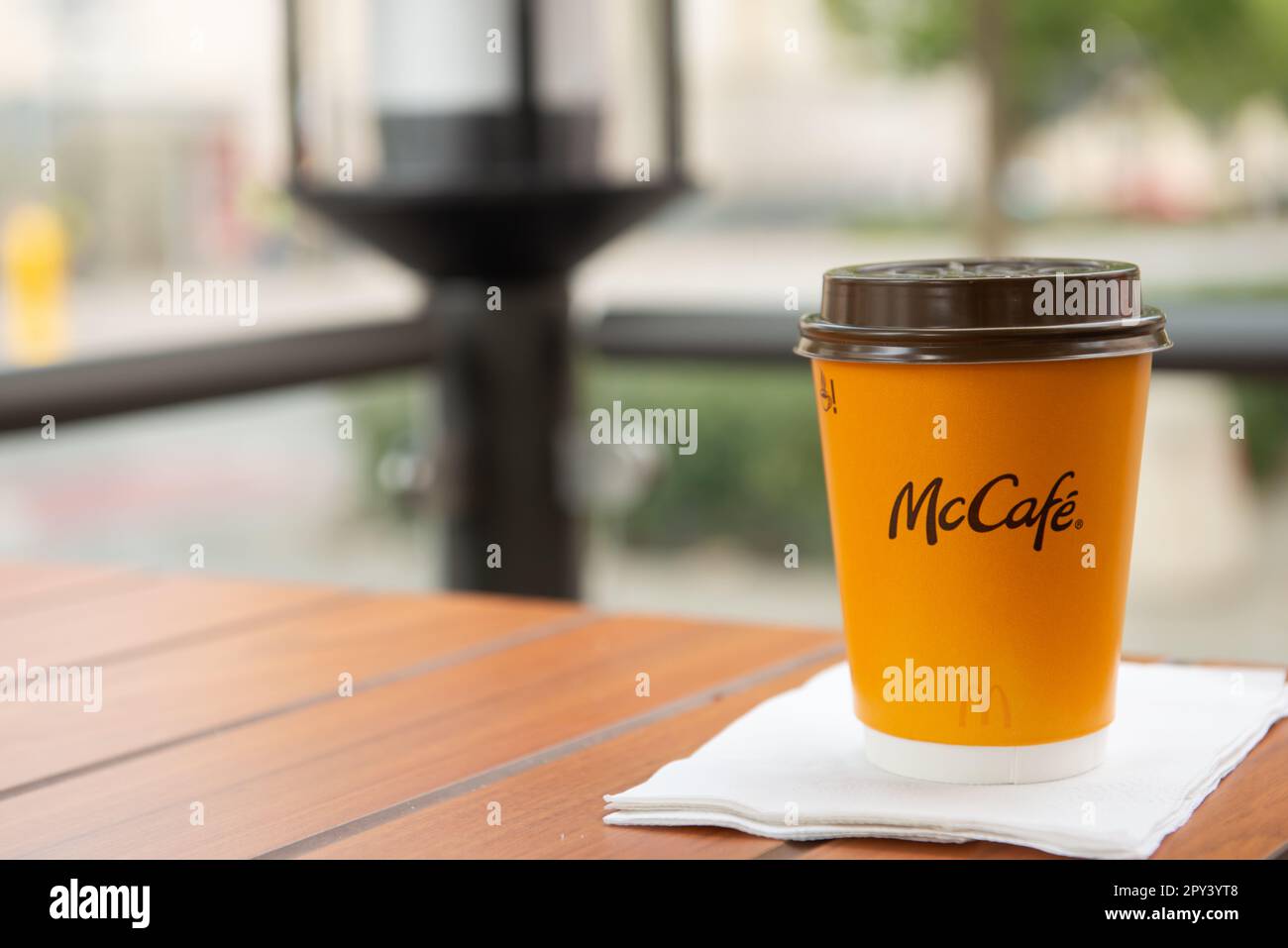 WARSAW, POLAND - SEPTEMBER 04, 2022: McDonald's hot drink on wooden ...