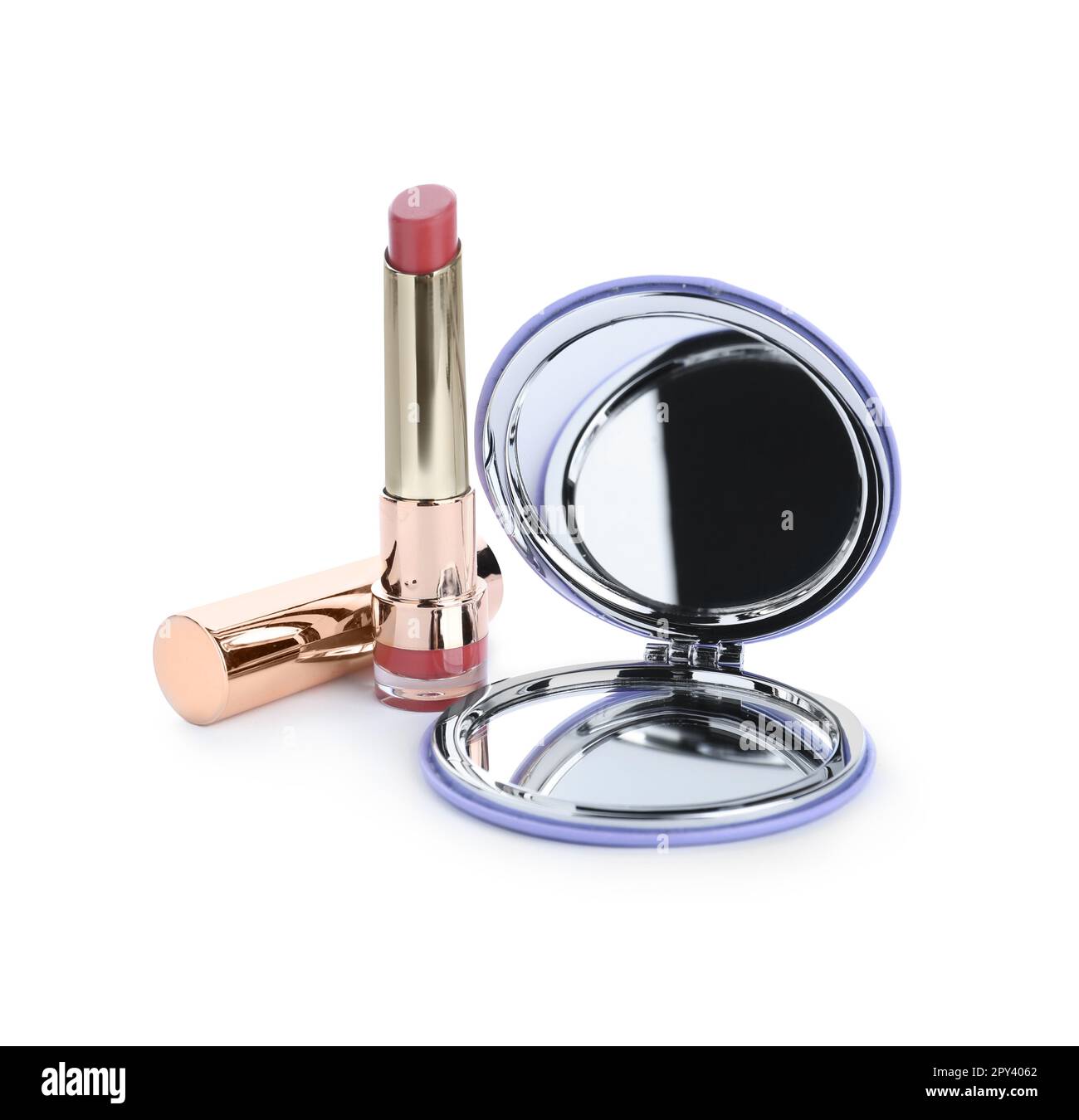 Stylish cosmetic pocket mirror and lipstick on white background Stock ...