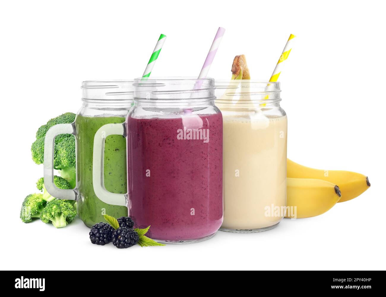 Different delicious smoothies in mason jars on white background Stock ...