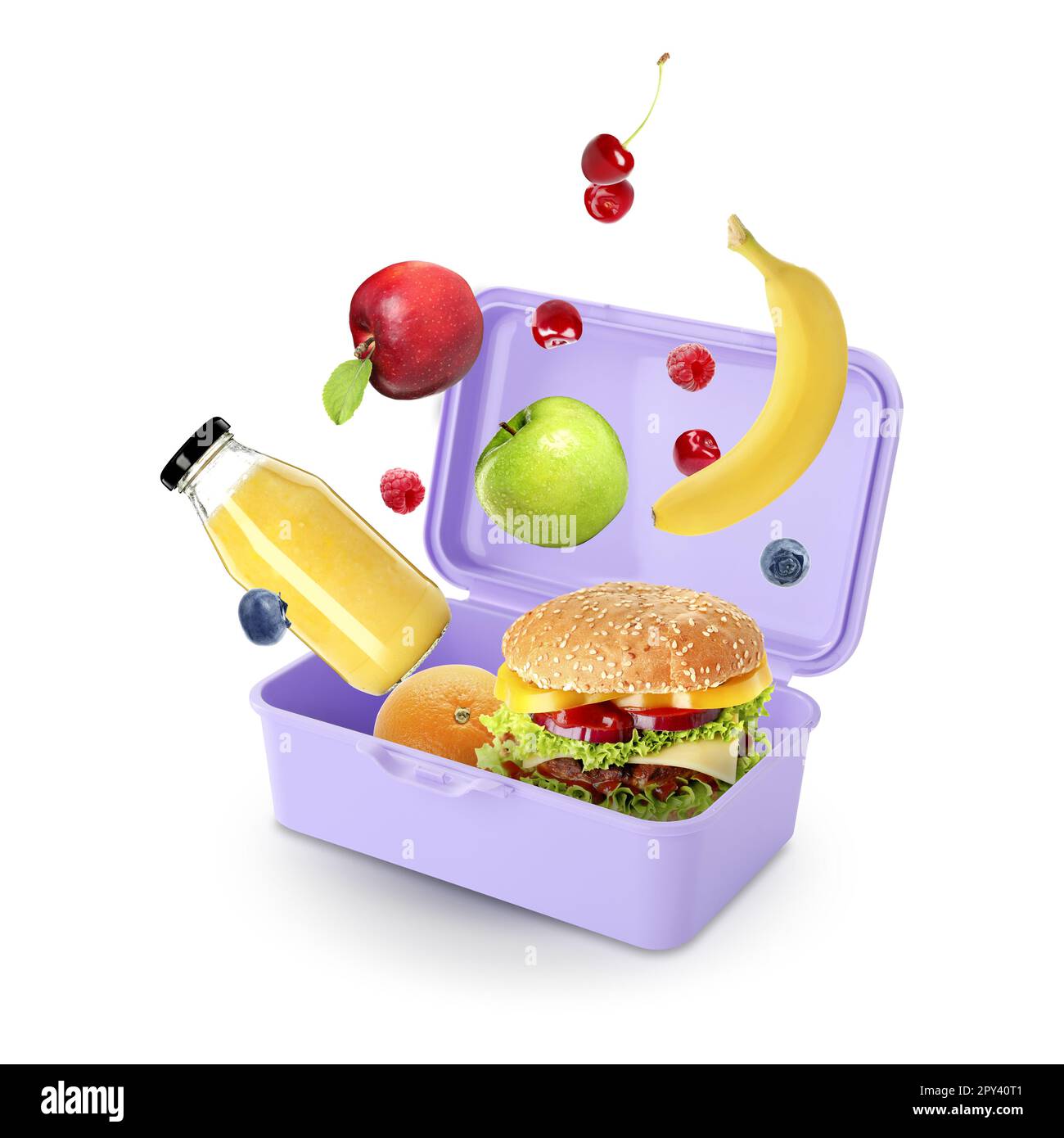 Different fresh food falling into lunch box on light background. School ...