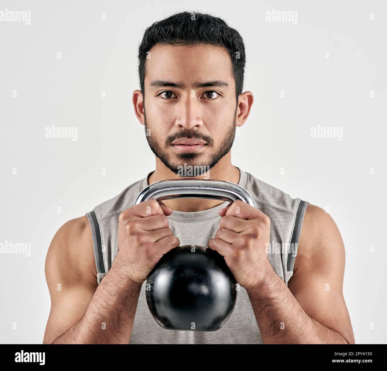 Working out makes me feel unstoppable. Studio portrait of a muscular ...