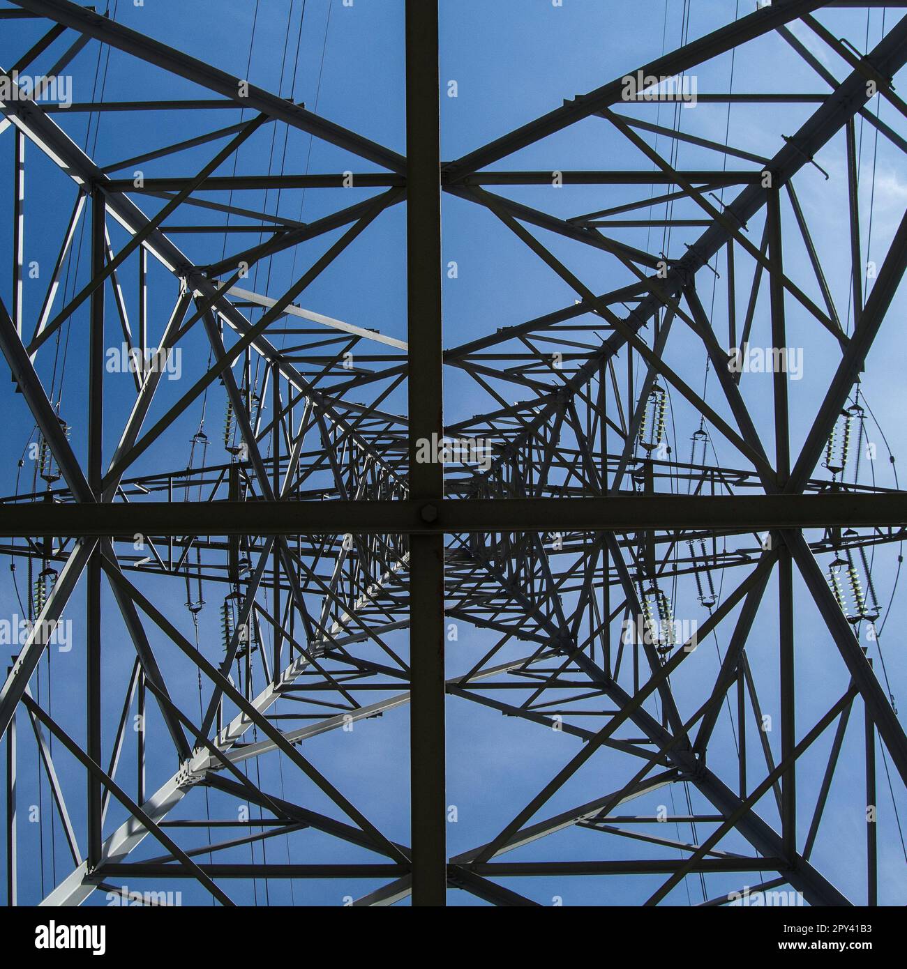Tower of a high voltage electric line. Bottom view Stock Photo - Alamy