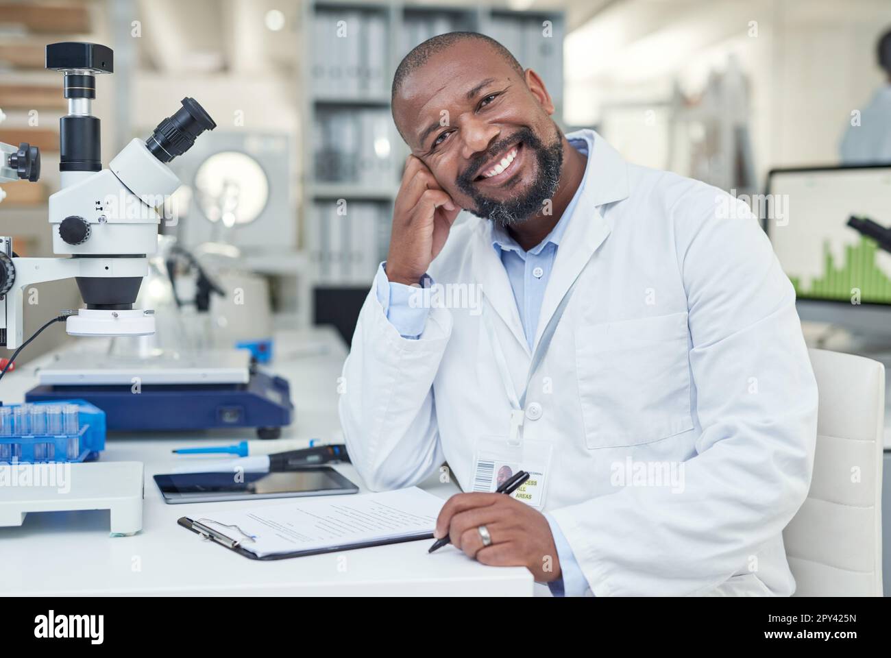 Lets talk about life. Portrait of a scientist conducting research in a ...