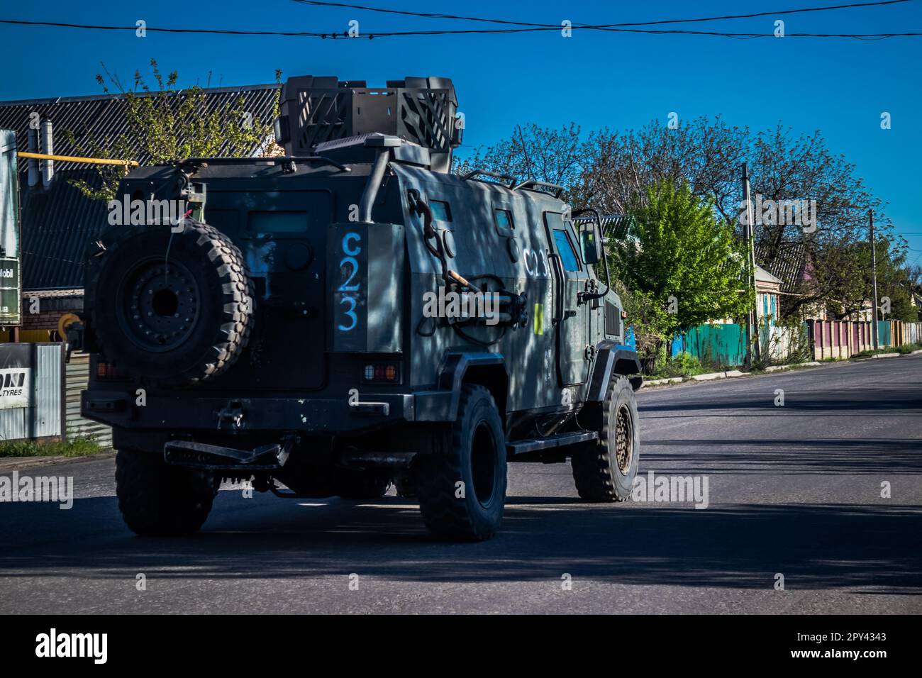 Ukrainian army armored car driving on the main road to Kramatorsk and ...