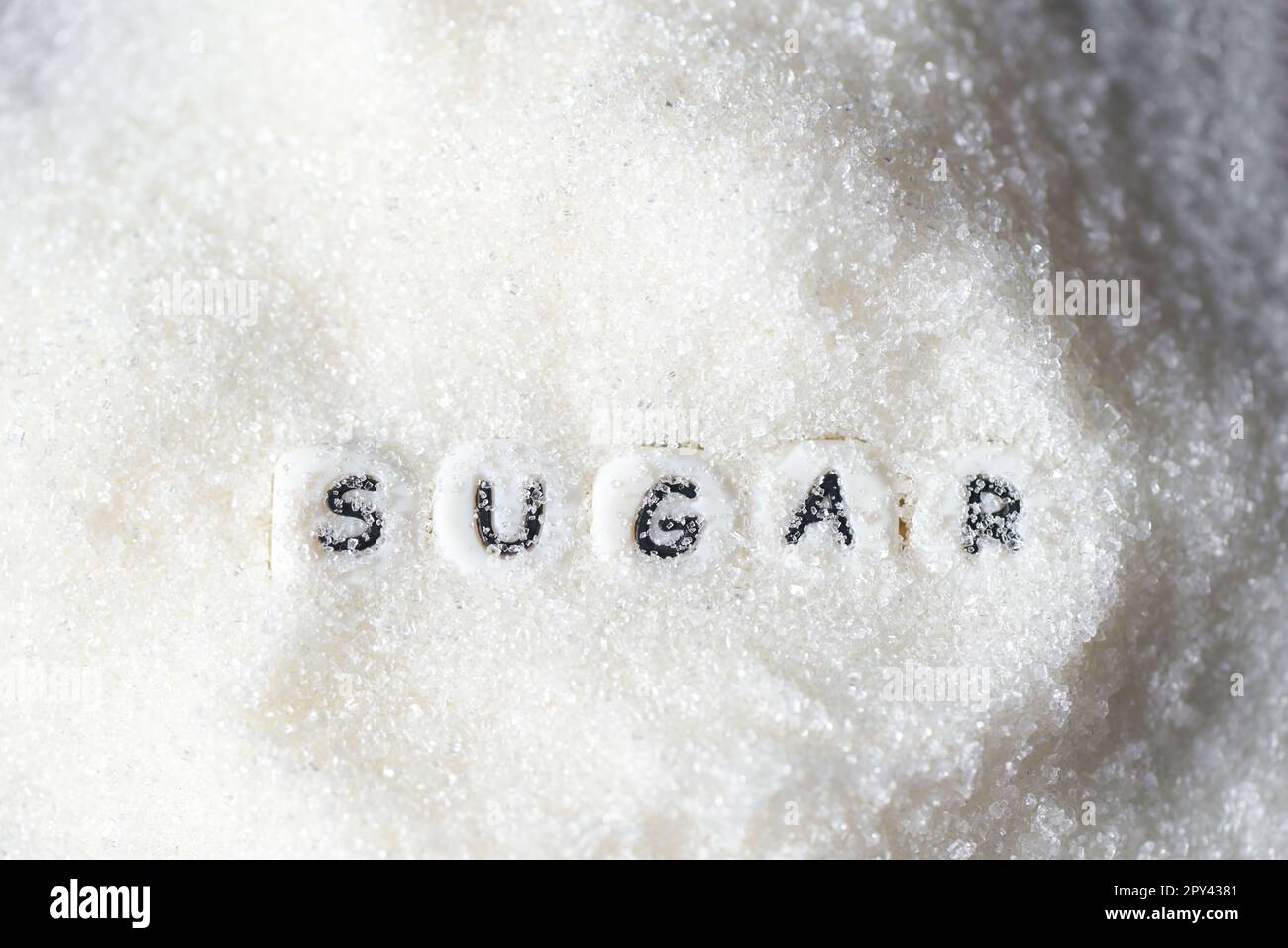 heap of sugar on background, white sugar for food and sweets dessert ...