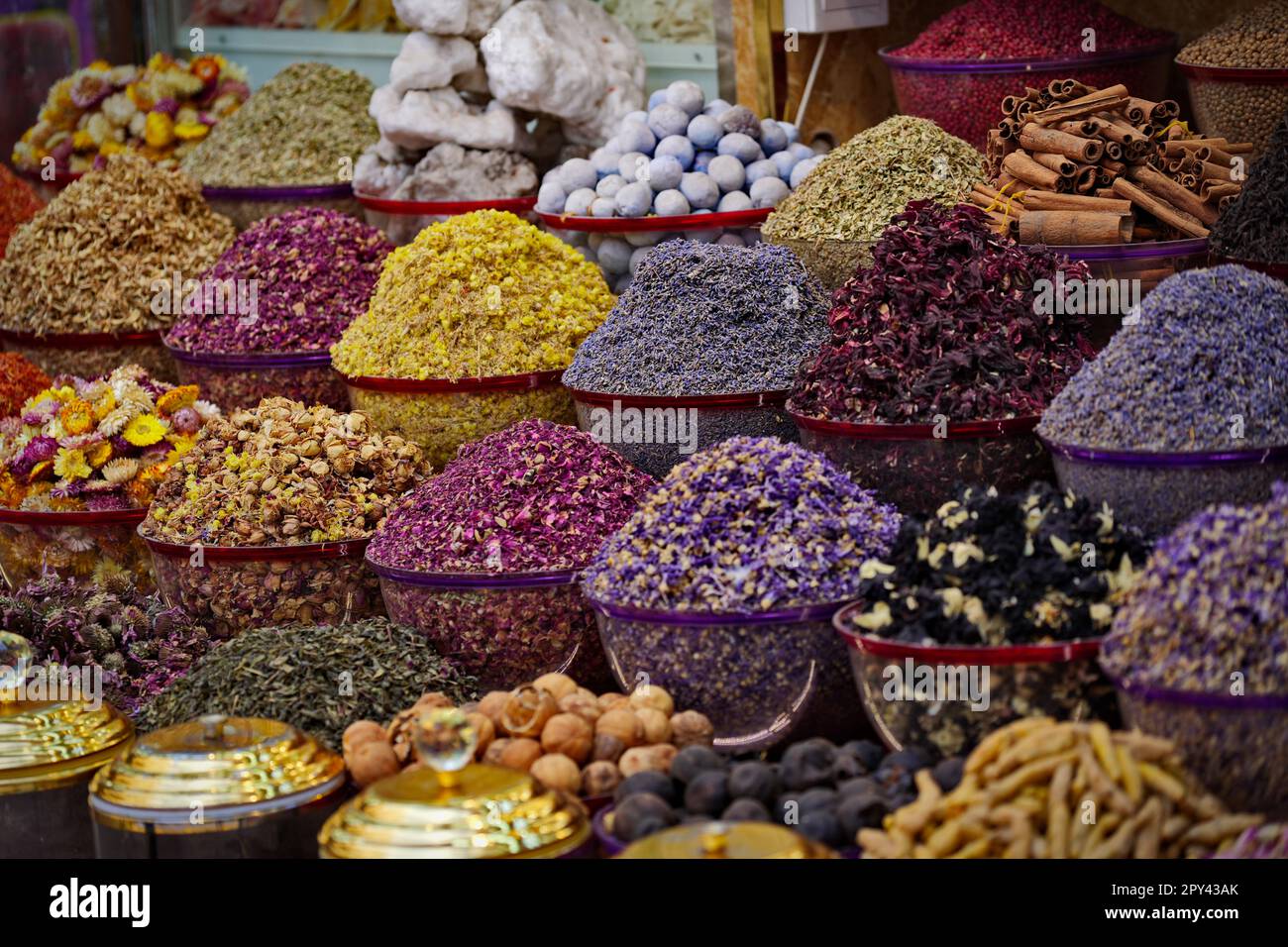 Variety of spices and dried herbs flowers on the arab street market ...