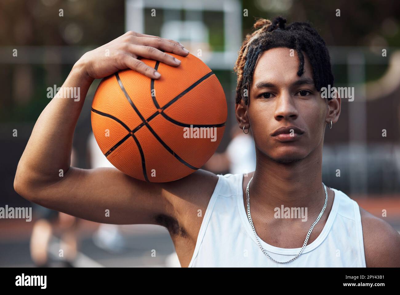 Keep your head up, champion. Portrait of a sporty young man standing on ...