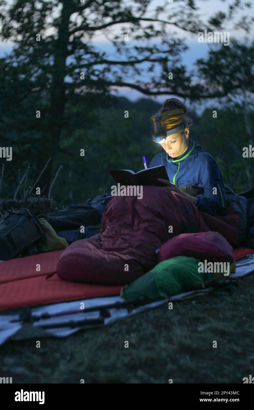 camping writing journal Stock Photo - Alamy