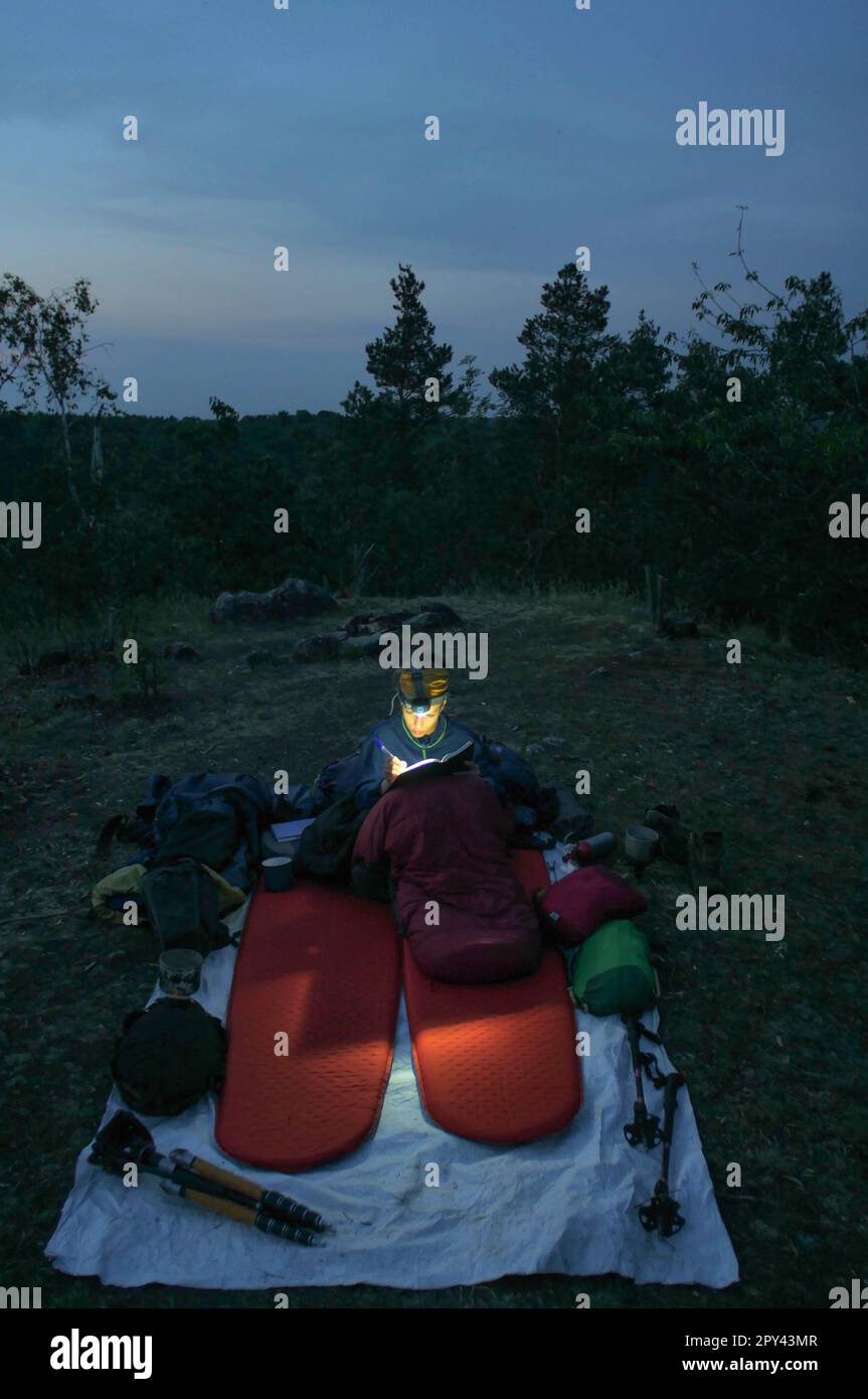 camping writing journal Stock Photo - Alamy