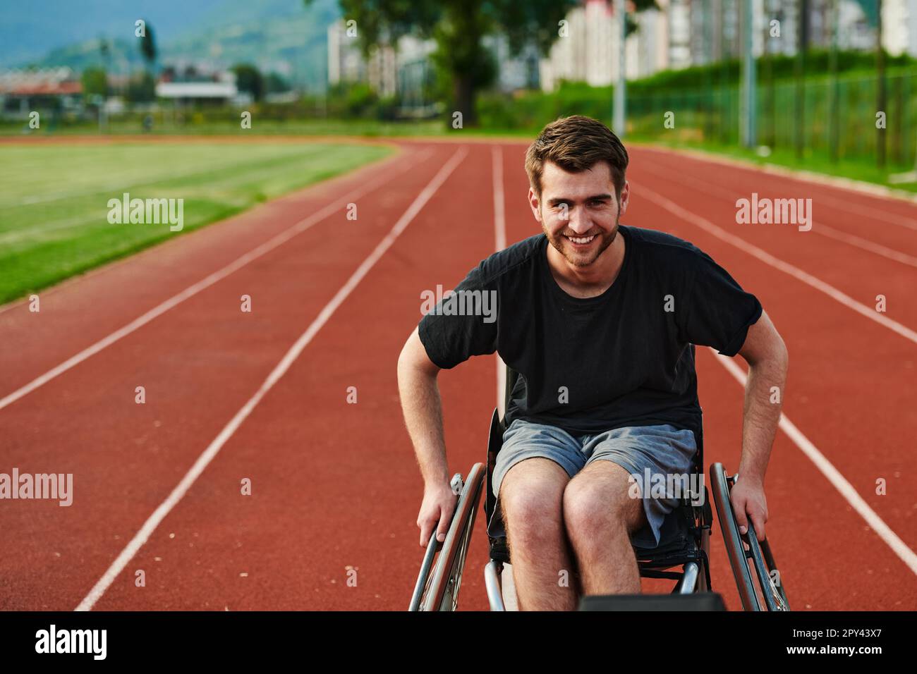 A person with disability in a wheelchair training tirelessly on the ...