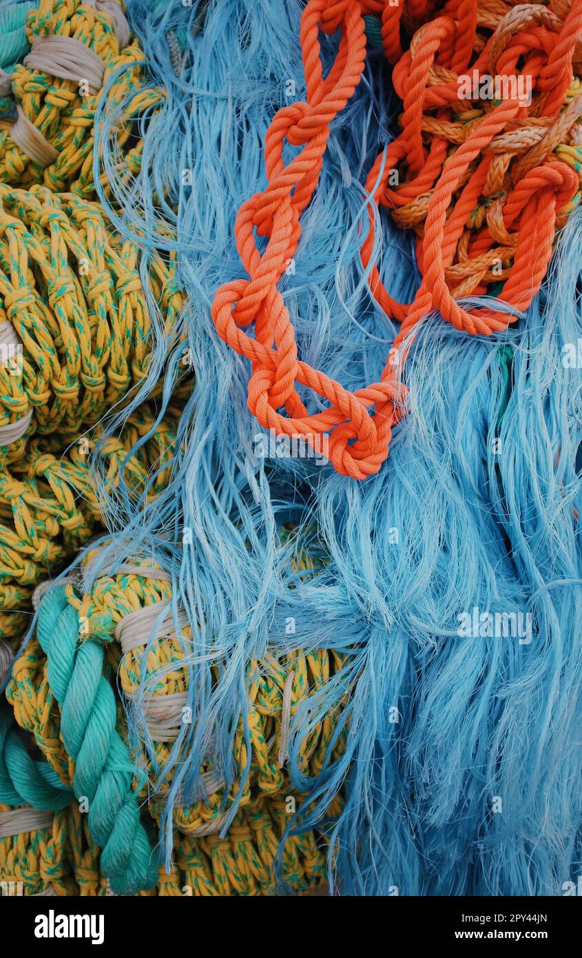 colourful pile of fishing nets and ropes Stock Photo - Alamy