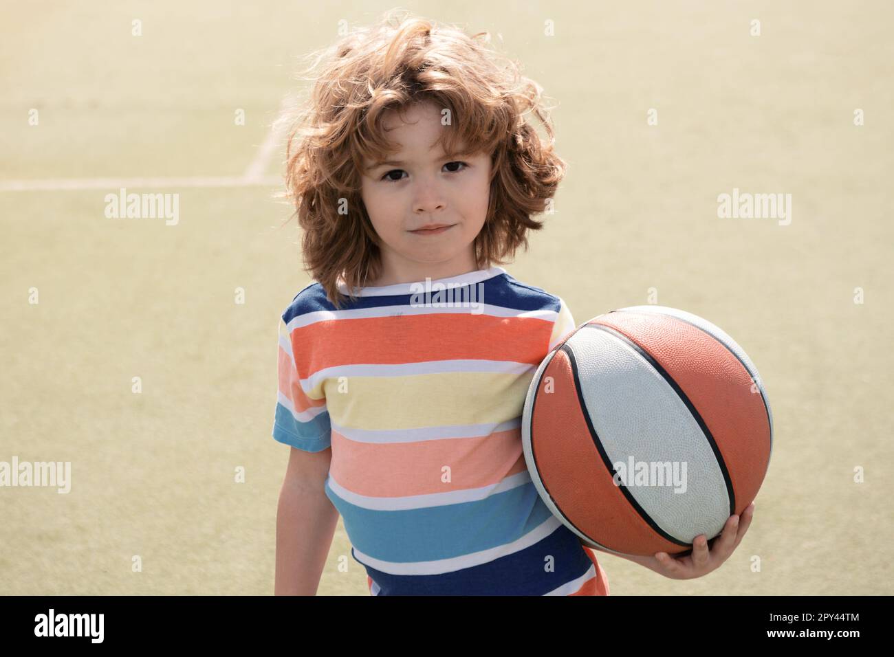Basketball kids training game. Portrait of sporty child. Young boy ...