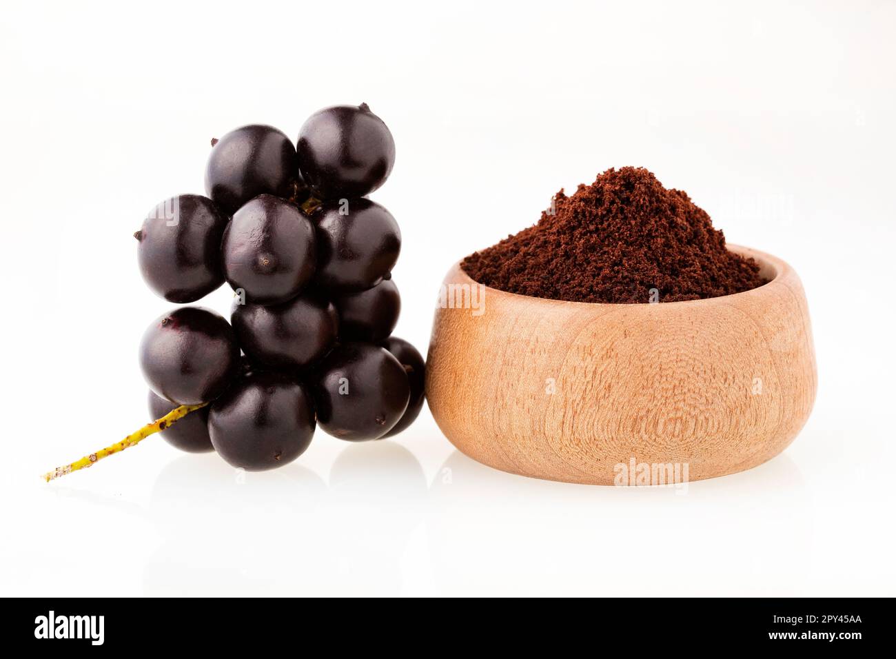 Amazonian acai berries and powder - Euterpe oleracea Stock Photo - Alamy