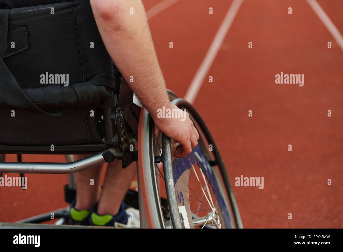 Close up photo of a person with disability in a wheelchair training ...