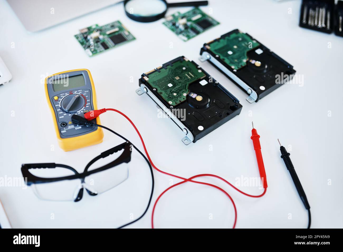 An Indispensable Tool In The World Of It A Multimeter Testing The Voltage Of Computer Hardware