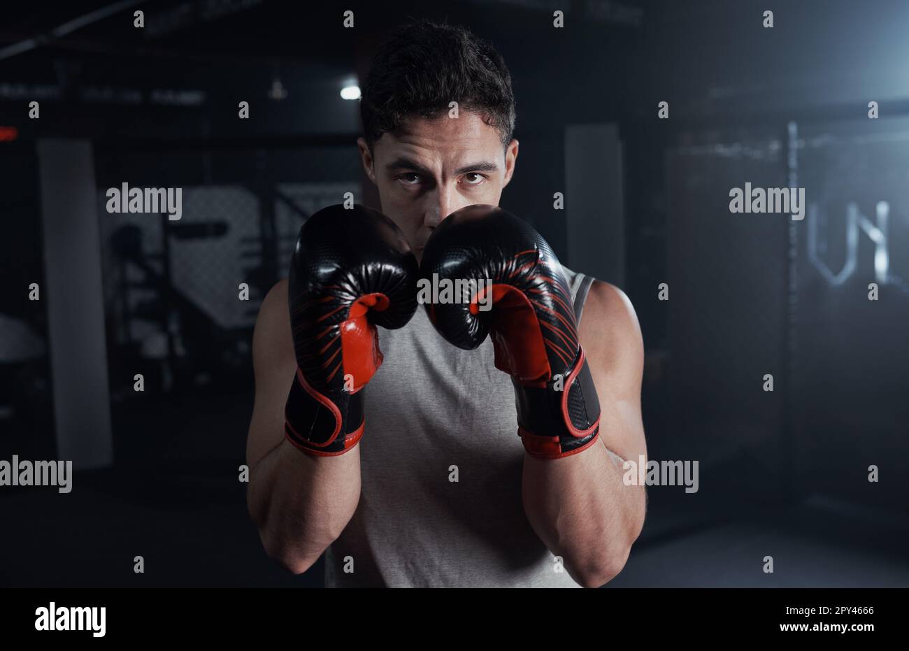 Prepare to be overpowered. Portrait of a young man practicing his ...