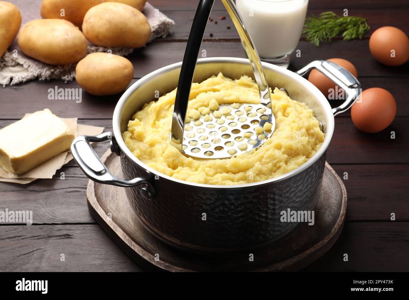 Mashing potato hi-res stock photography and images - Alamy
