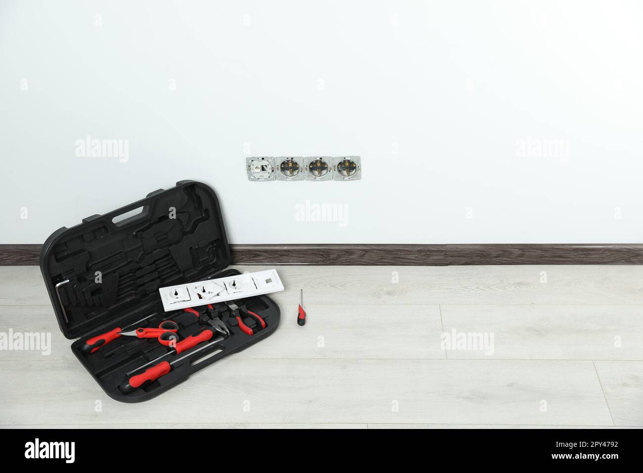 Set of tools and sockets in room. Space for text Stock Photo - Alamy