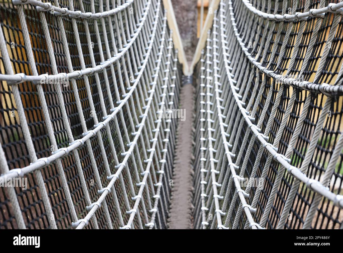 Rope net attached to tree in zoo, closeup Stock Photo - Alamy