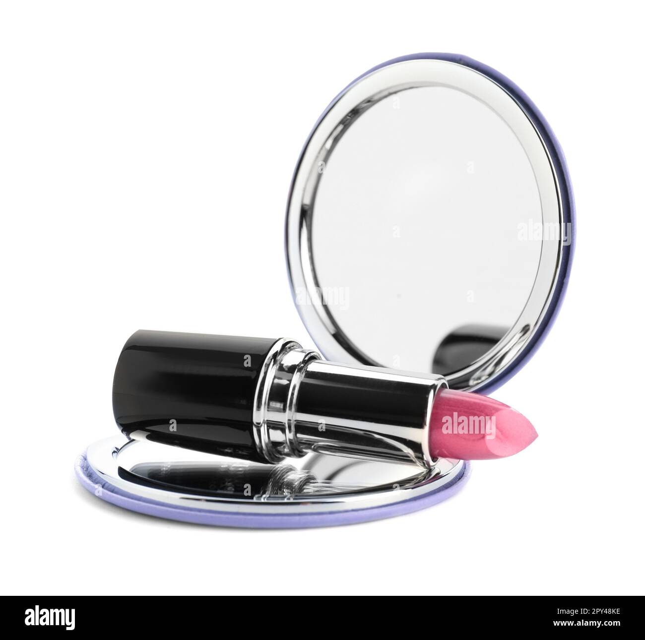 Stylish cosmetic pocket mirror and lipstick on white background Stock ...