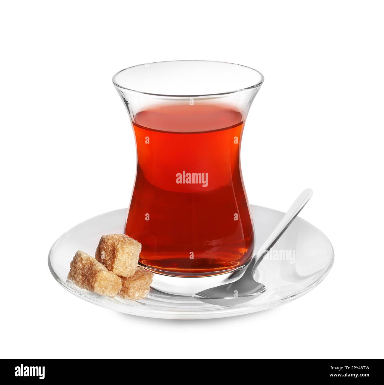 Glass of traditional Turkish tea with sugar cubes and spoon isolated on ...