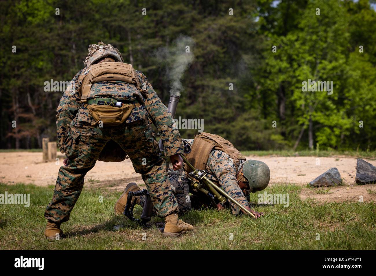 U.S. Marines with The Basic School fire mortars during a day squad ...