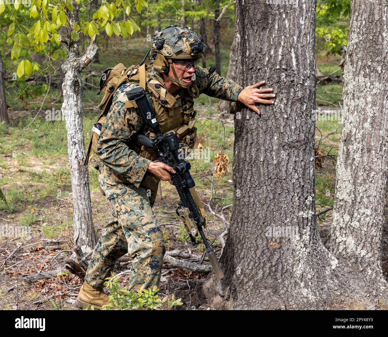 A U.S. Marine with 4th Marine Division participates in a live and ...