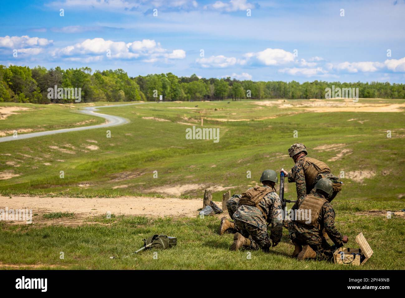 U.S. Marines with The Basic School fire mortars during a day squad ...